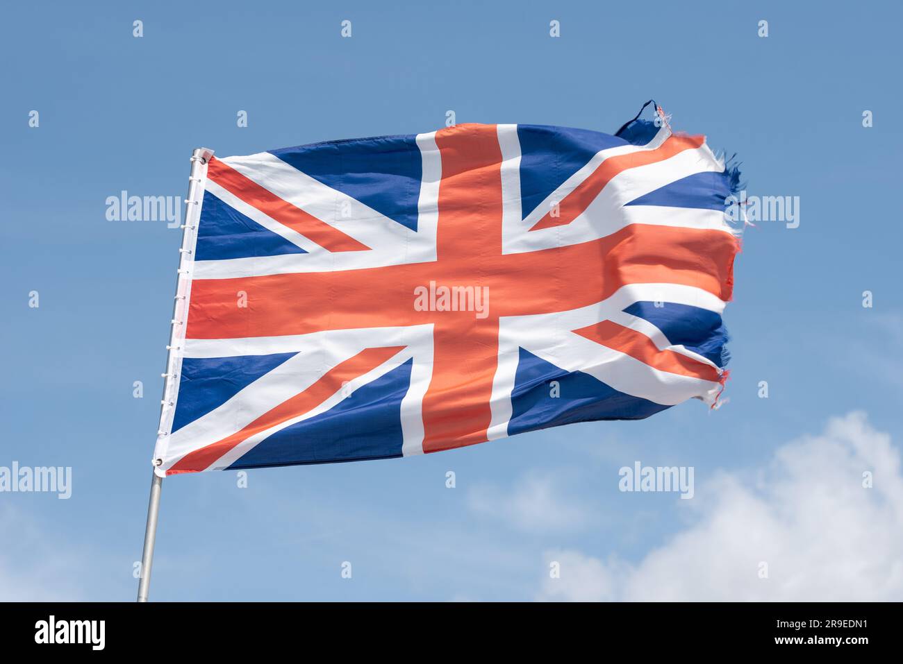 British Union Jack flag flapping in a strong wing Stock Photo - Alamy