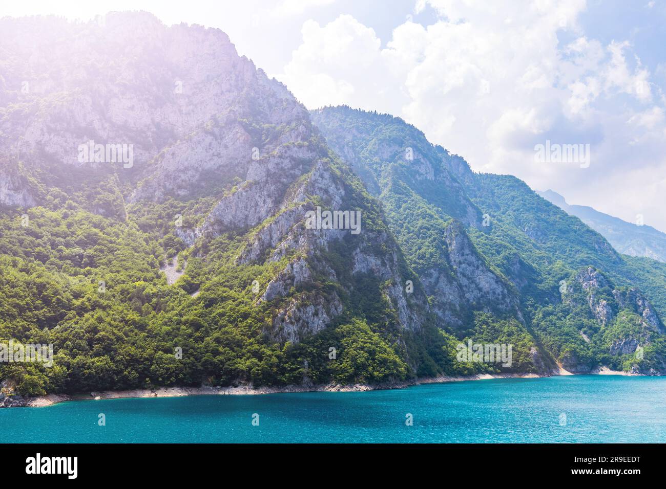 Landscape view of big lake between mountains at summer day Stock Photo ...