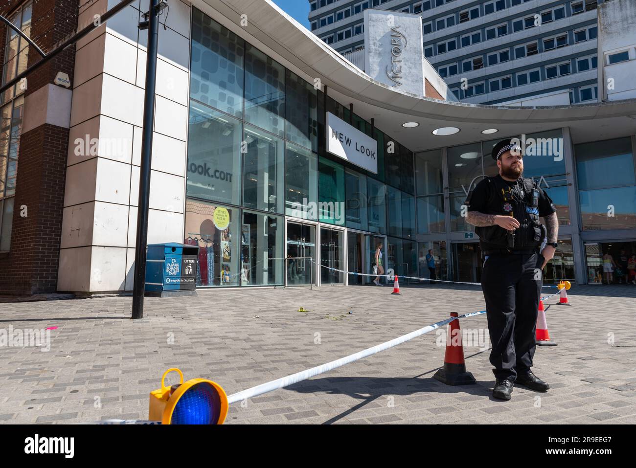 Crime scene outside the Victoria shopping centre guarded by a police ...