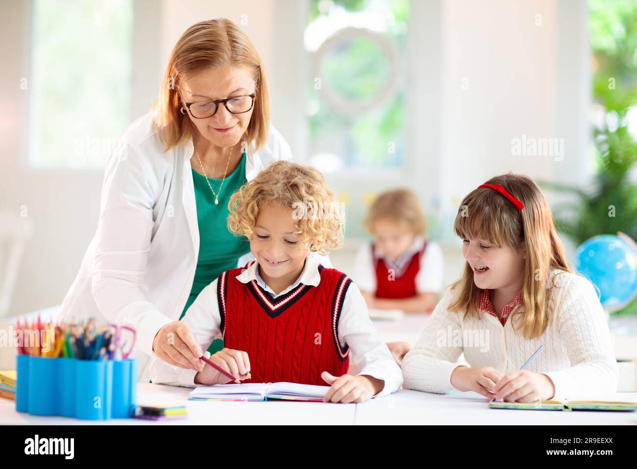 Kids in school. Preschool children in class. Happy kids back to school ...