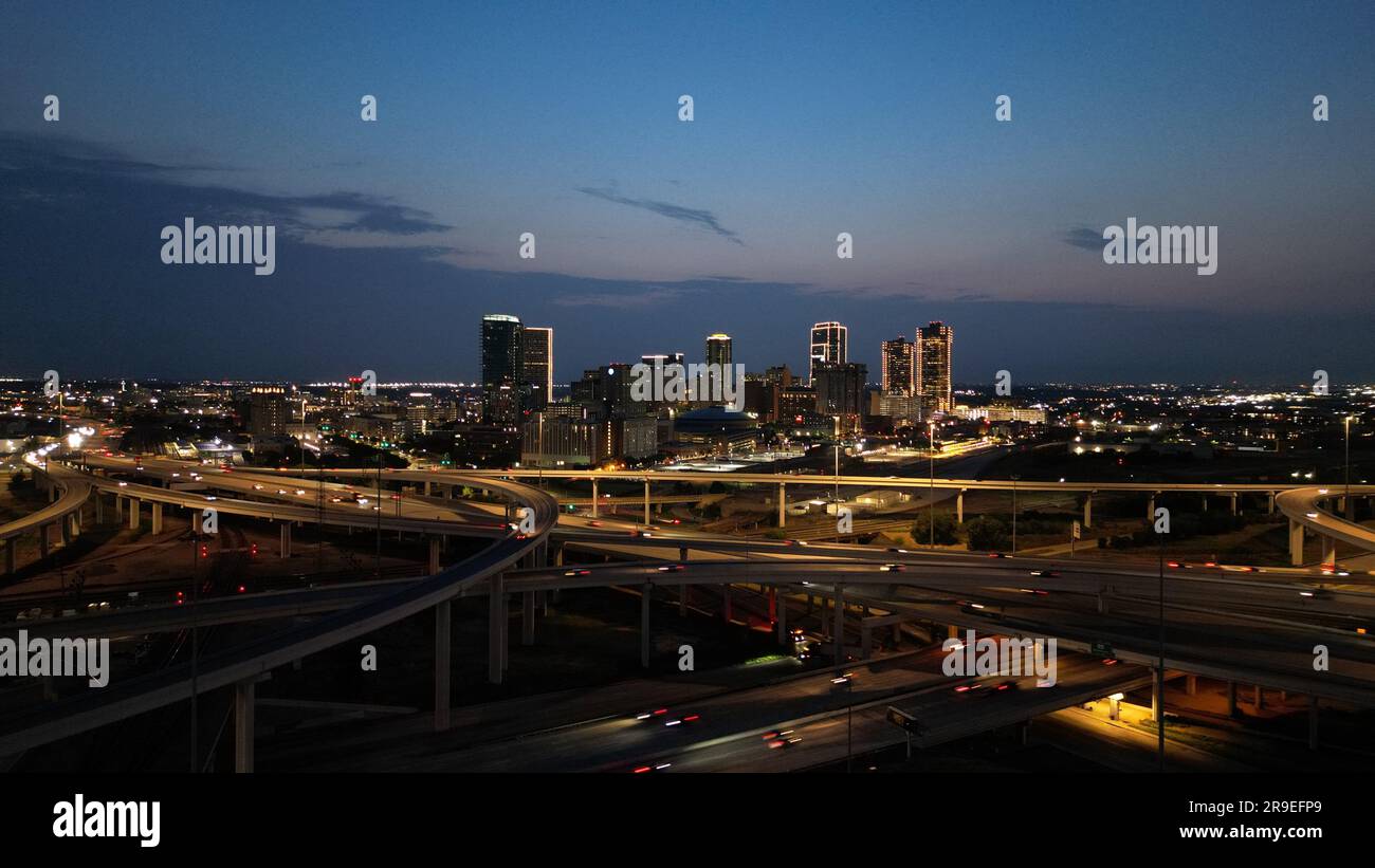 An aerial view of the Fort Worth, Texas skyline at night, illuminated ...
