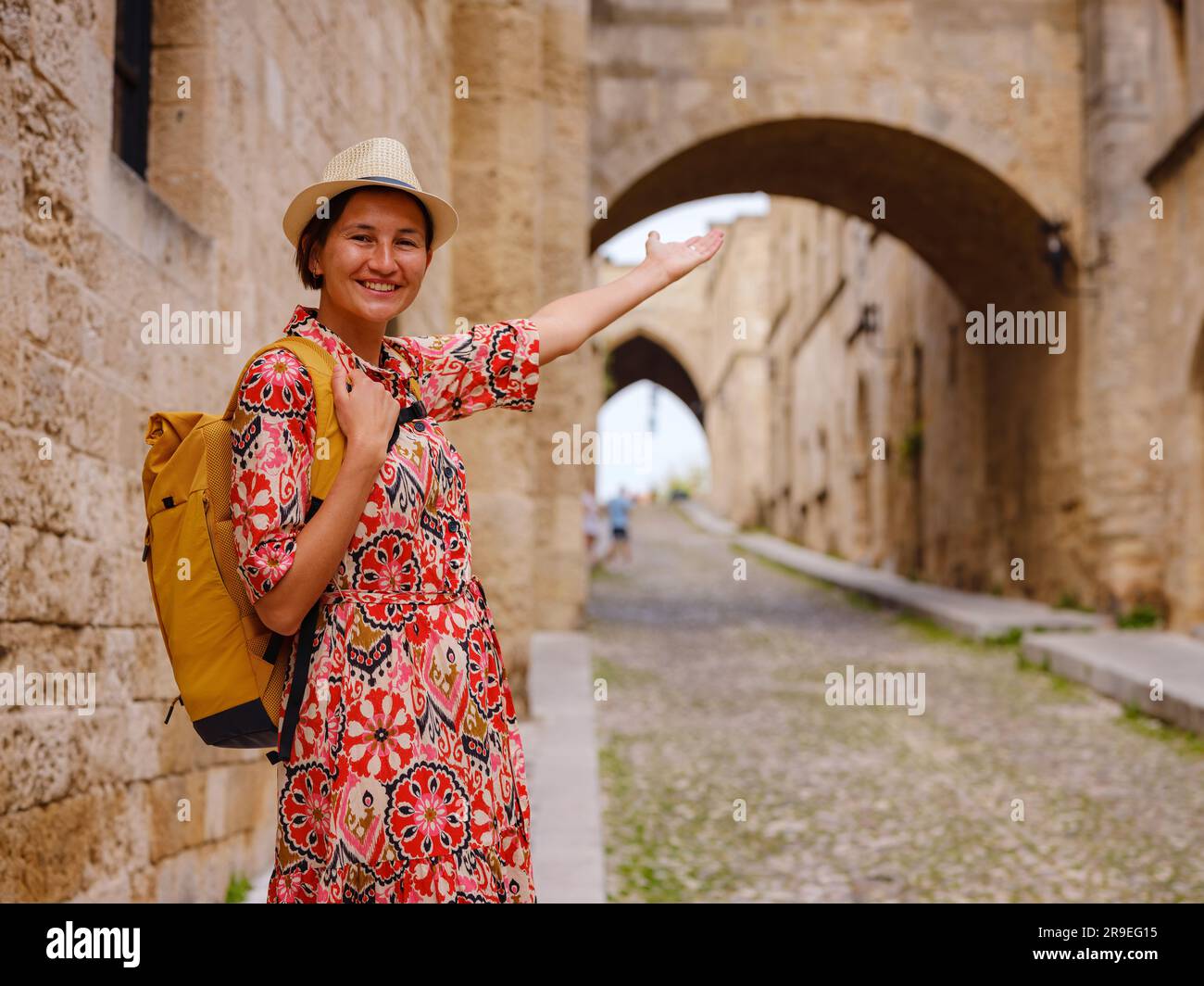 summer trip to Rhodes island, Greece. Young Asian woman in ethnic red ...