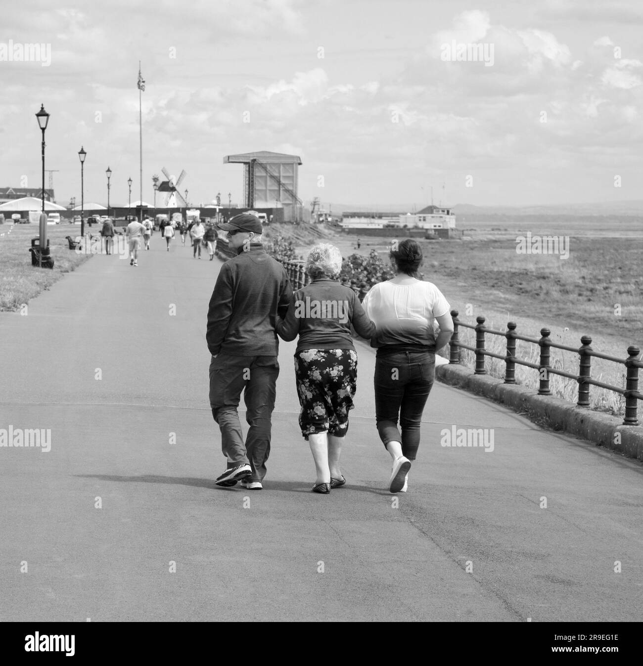 A view of a family group as they stroll along the promenade at Lytham ...