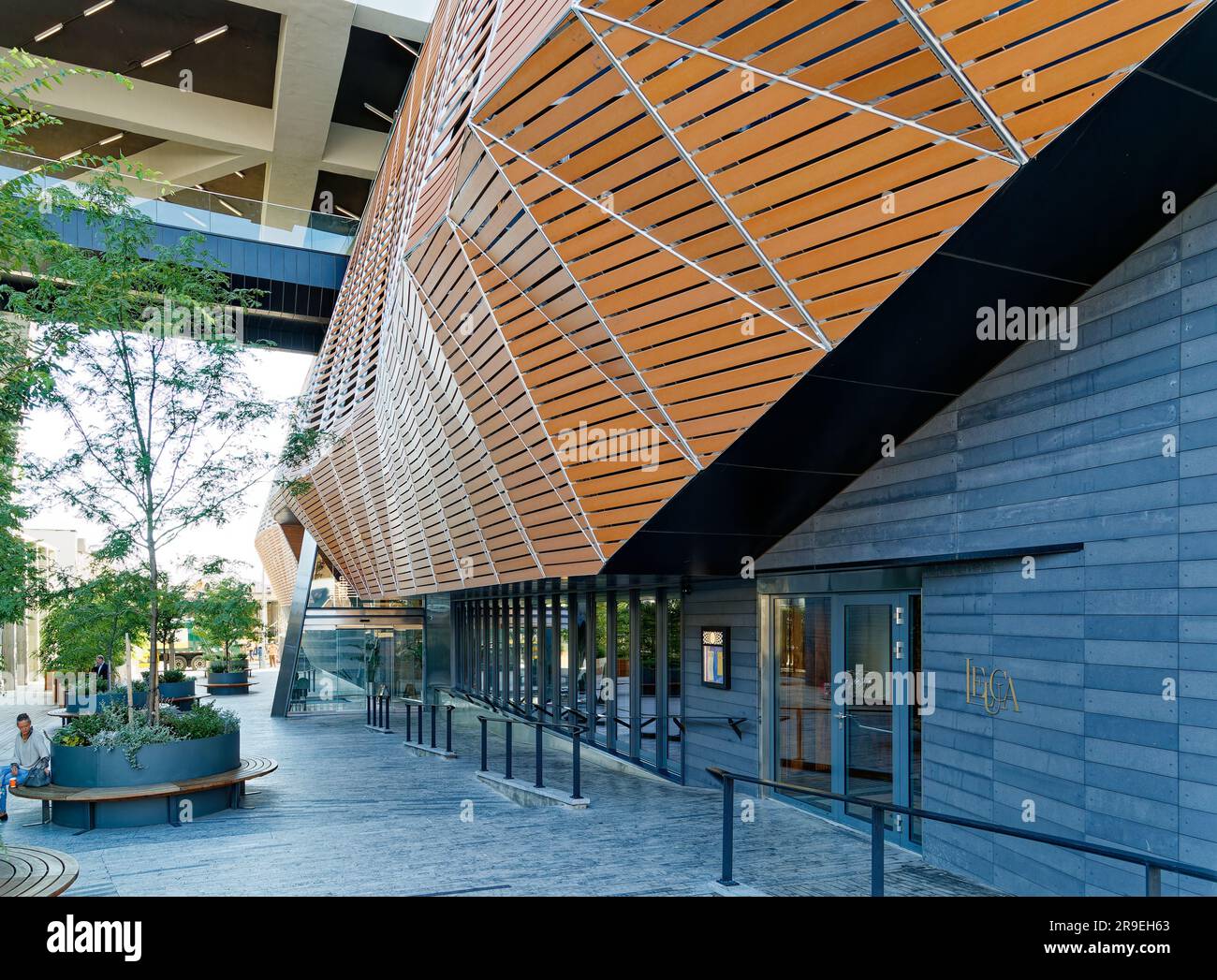 The William Vale hotel rises over truss-enclosed office floors, which ...