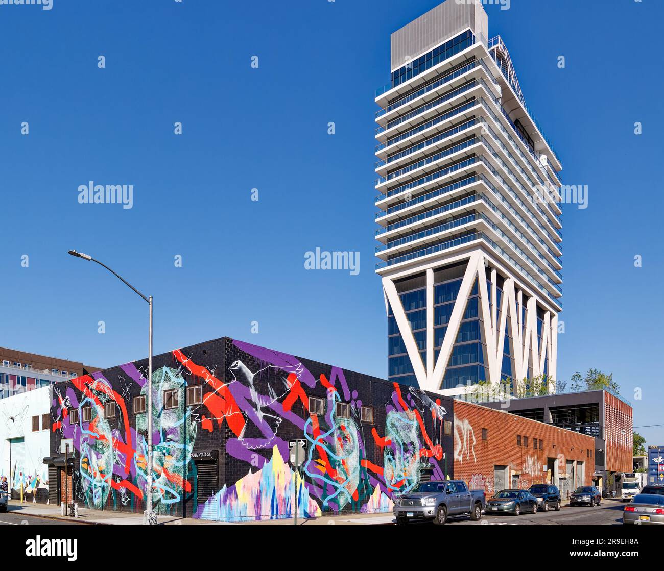 The William Vale hotel rises over truss-enclosed office floors, which ...