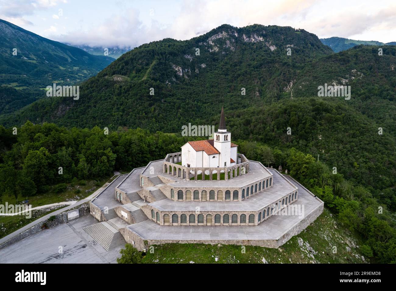 Drone view of St Anton Church and Kobarid Ossuary in Slovenia ...