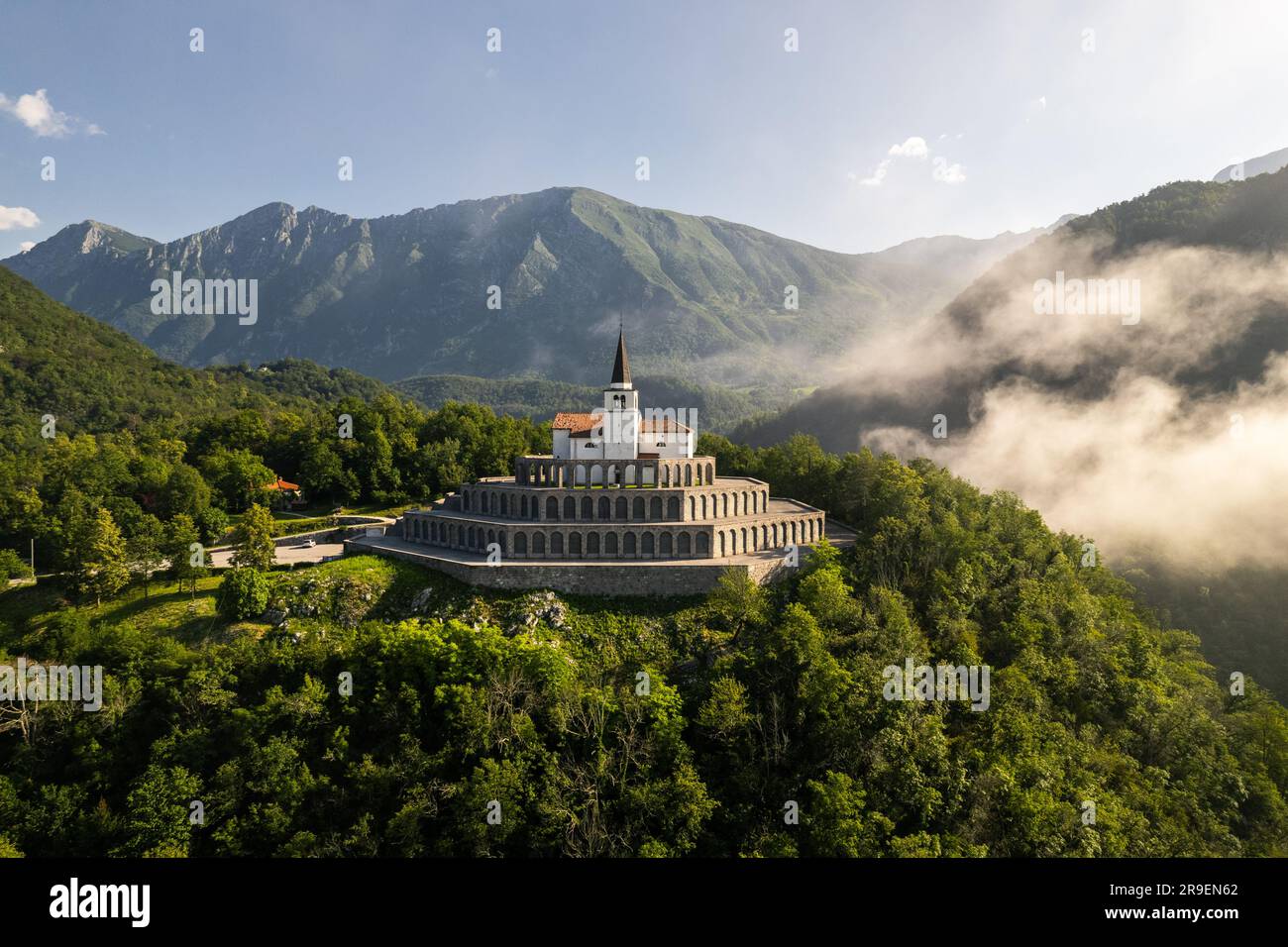 Drone view of St Anton Church and Kobarid Ossuary in Slovenia ...