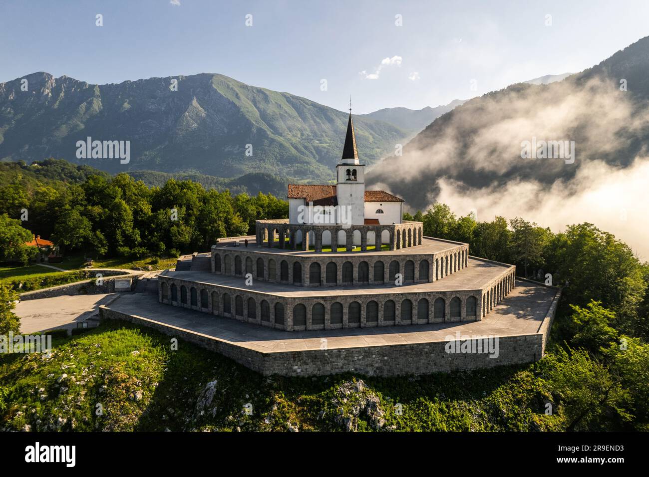 Drone view of St Anton Church and Kobarid Ossuary in Slovenia ...