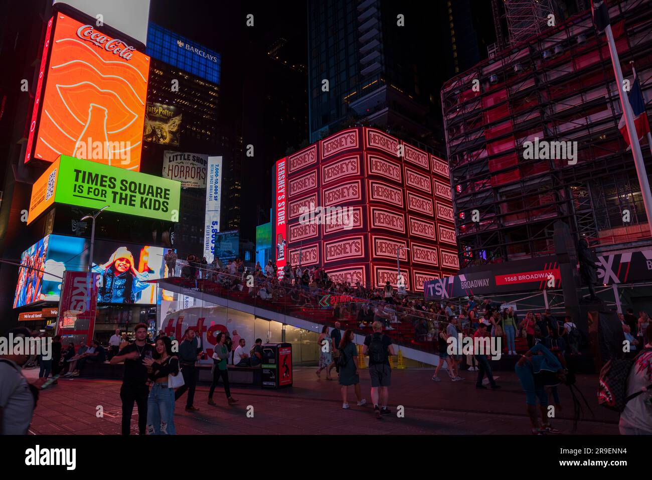 Beautiful night view of Red Stairs on Times Square in New York with ...