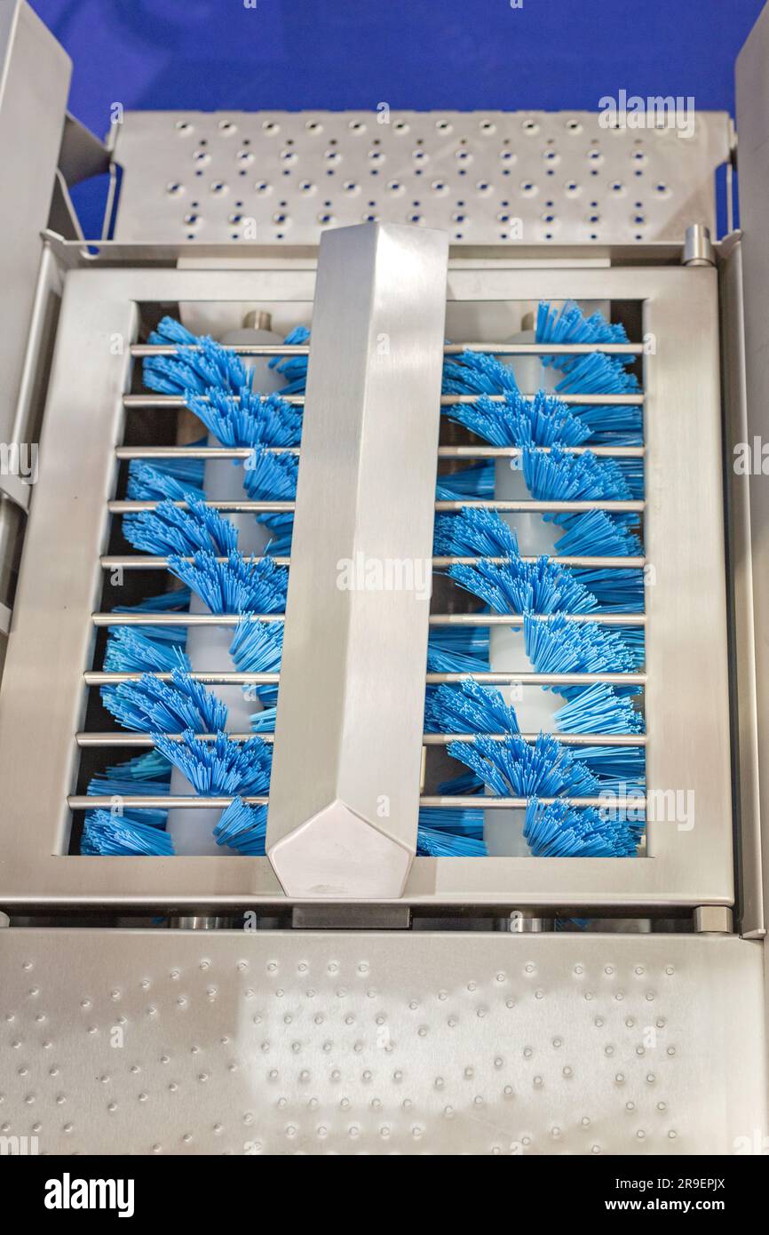 Automatic Boot Washing Machine at Entry to Food Factory Stock Photo - Alamy