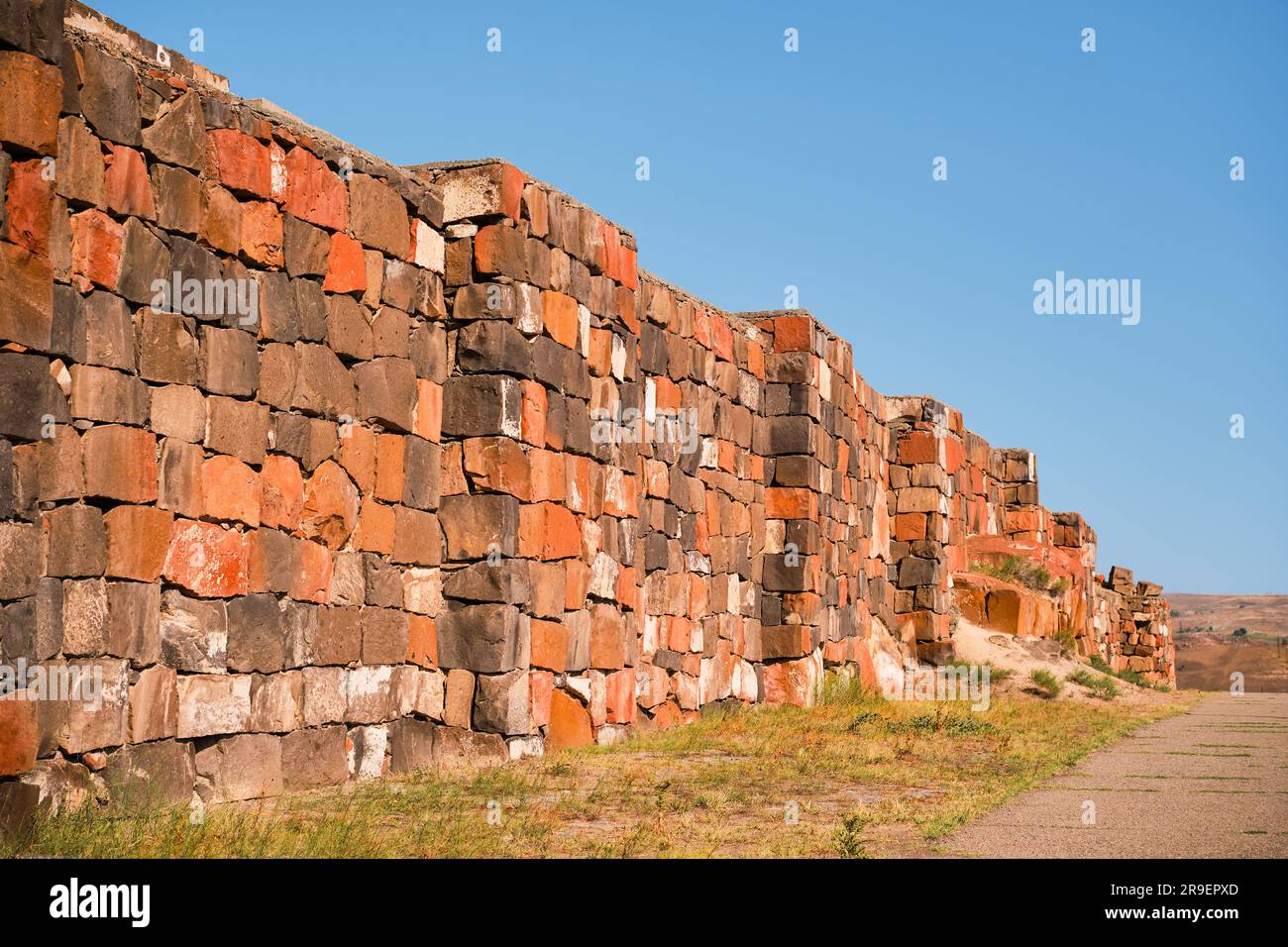 Restored walls of the ancient fortress of Erebuni, the kingdom of Urartu in present-day Yerevan ...