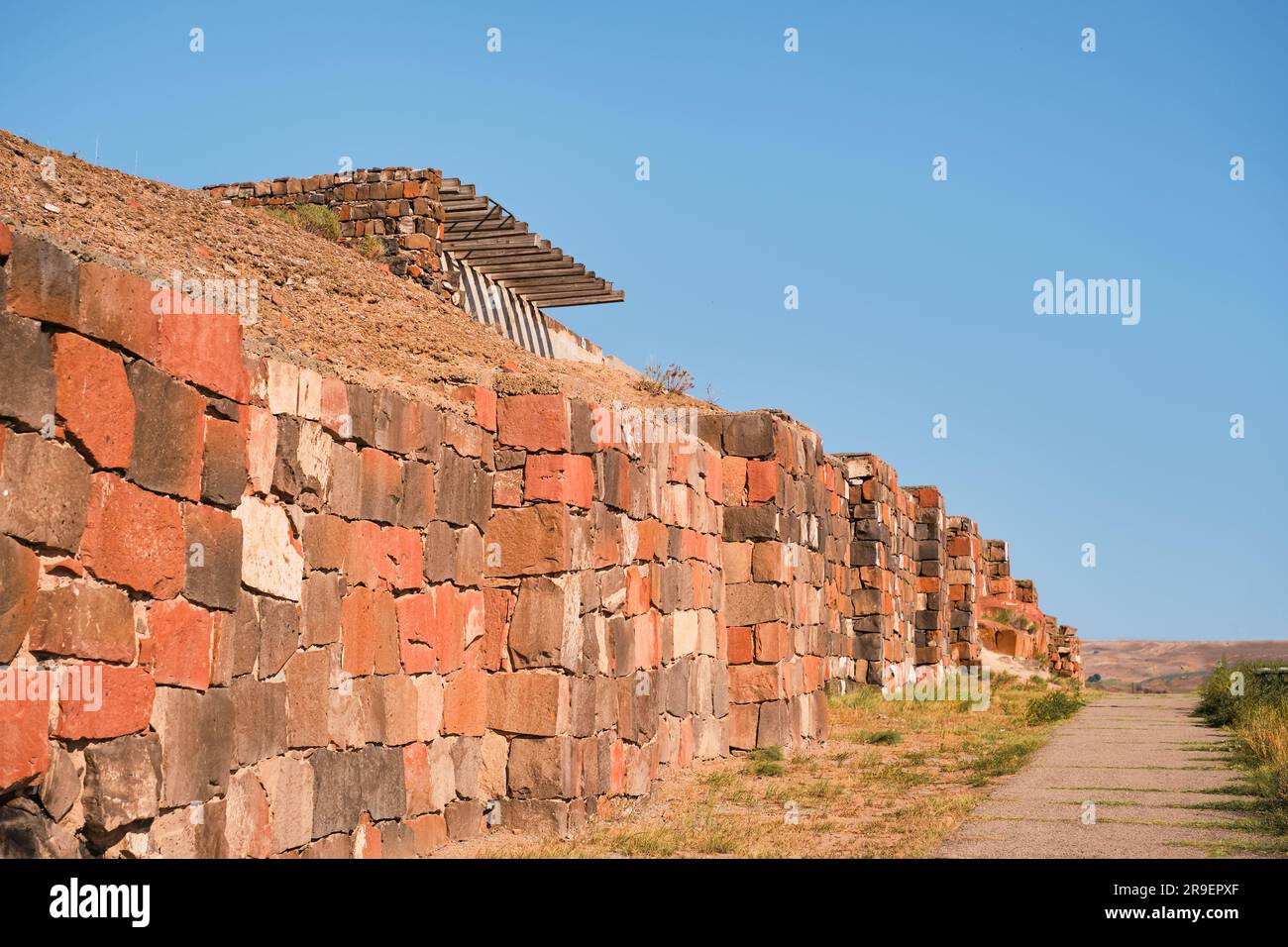 Restored walls of the ancient fortress of Erebuni, the kingdom of Urartu in present-day Yerevan ...