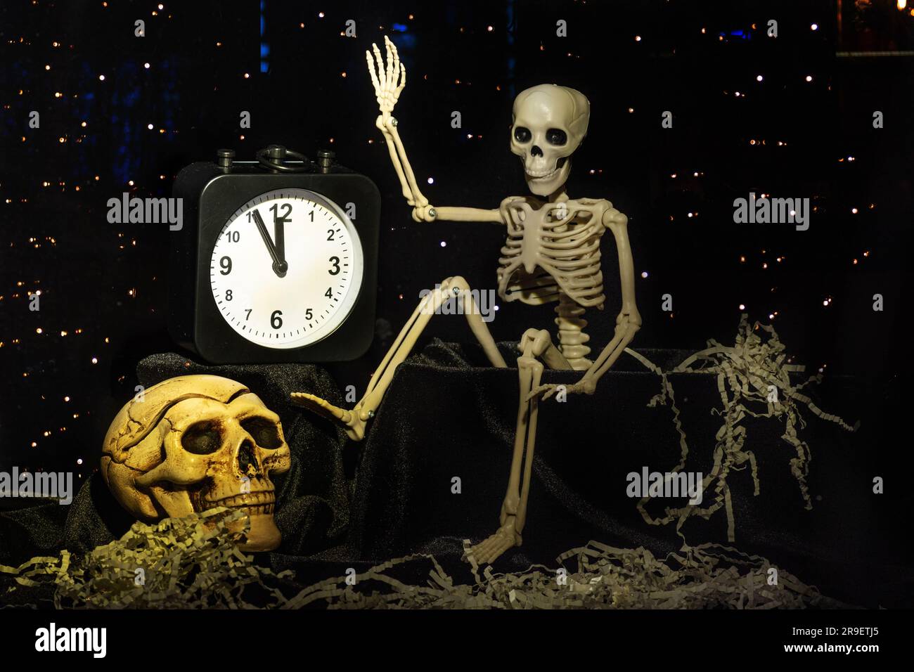 A skeleton waking up, crawling out of the grave and turning off the ...