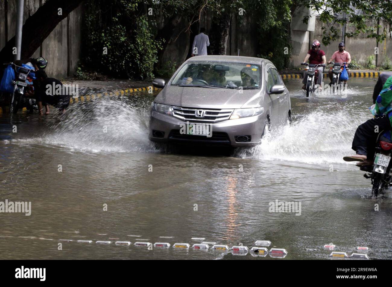 Karachi, Pakistan June 26, 2023. Commuters are facing difficulties in ...