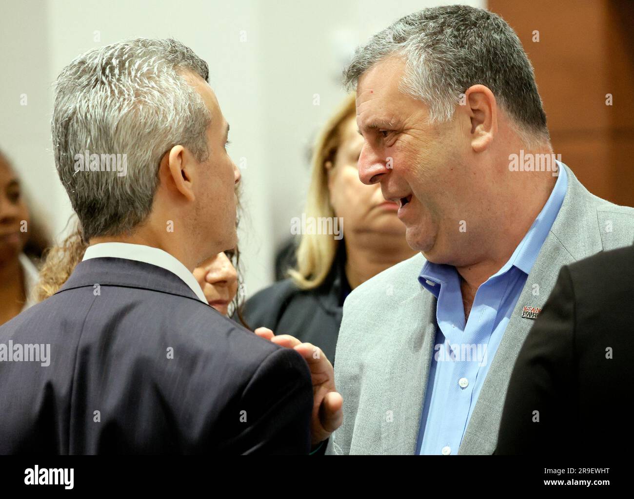 Tony Montalto speaks with Max Schachter during a break in closing ...