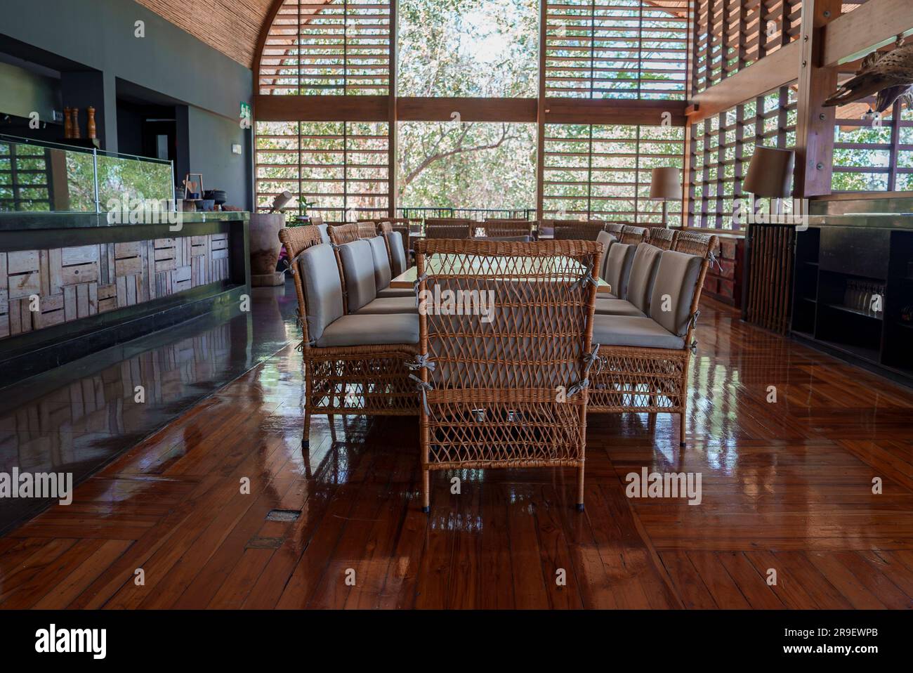 Large dining table sitting arrangement, counter desk at hotel Stock ...