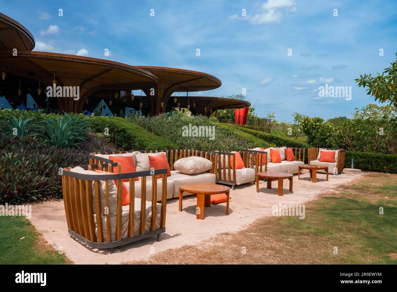 Seating arrangement outdoors at luxury resort garden Stock Photo - Alamy