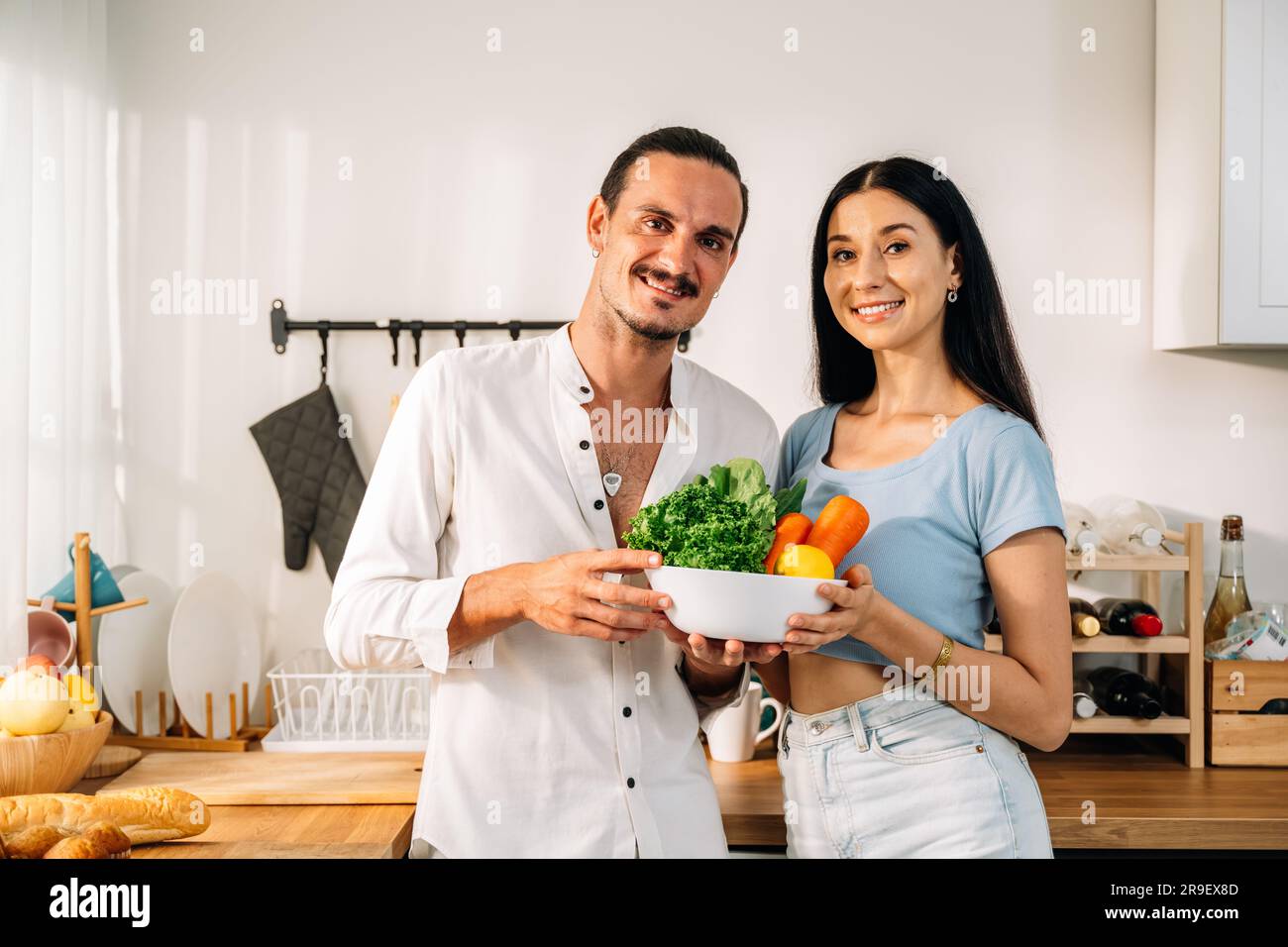 Healthy lovers cooking food in kitchen, Couple spending time together ...