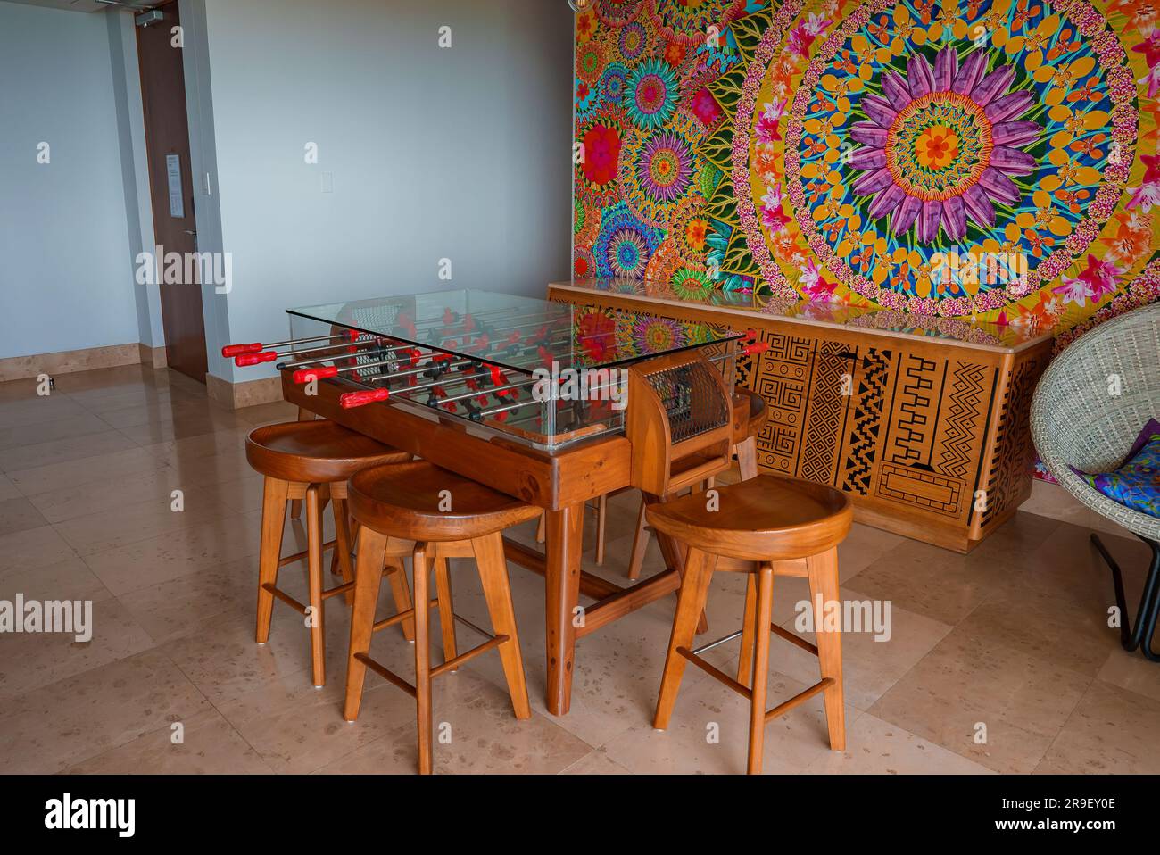 Foosball table to play football game Stock Photo - Alamy