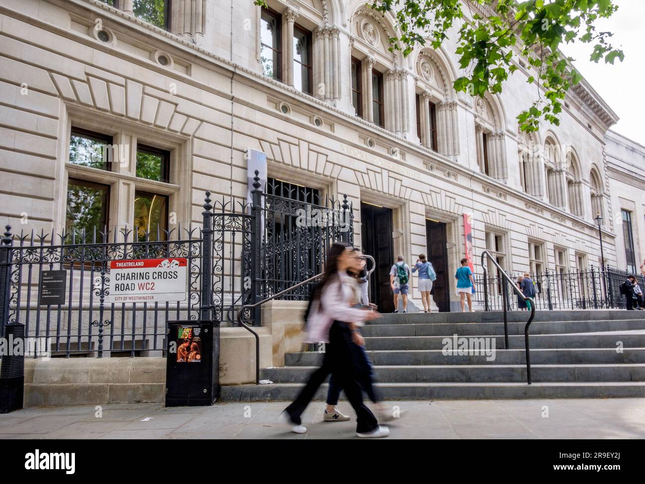 Pedestrians on Charing Cross Road pass the National Portrait Gallery ...