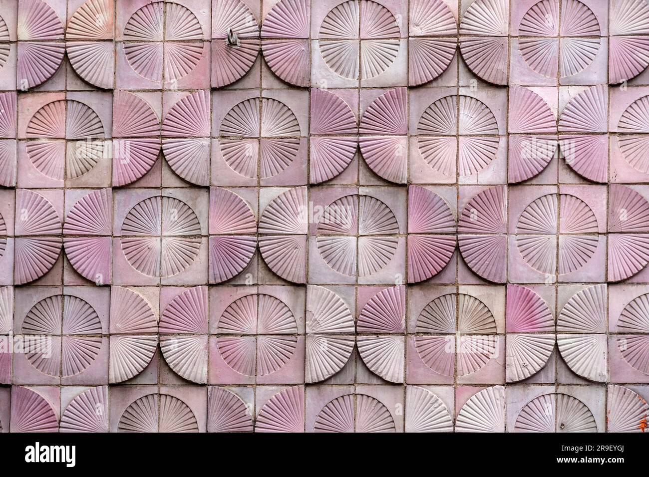 Mid-century modern style tiled wall with half circle decorations ...