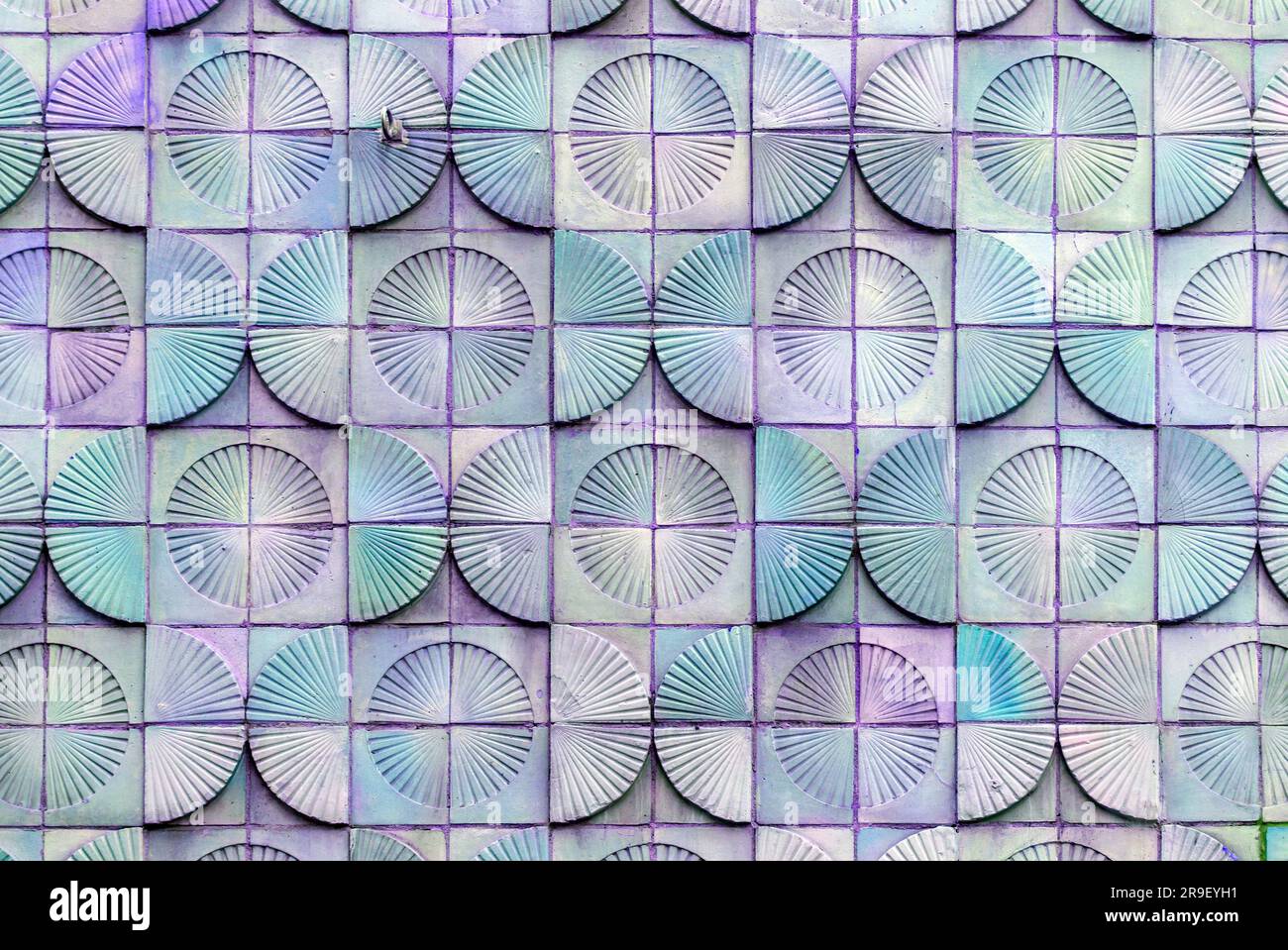 Mid-century modern style tiled wall with half circle decorations ...