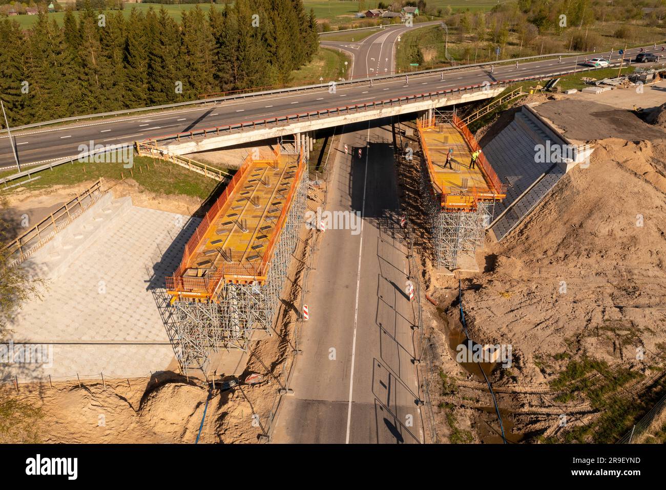 Drone photography of highway bridge being built during summer day. High ...