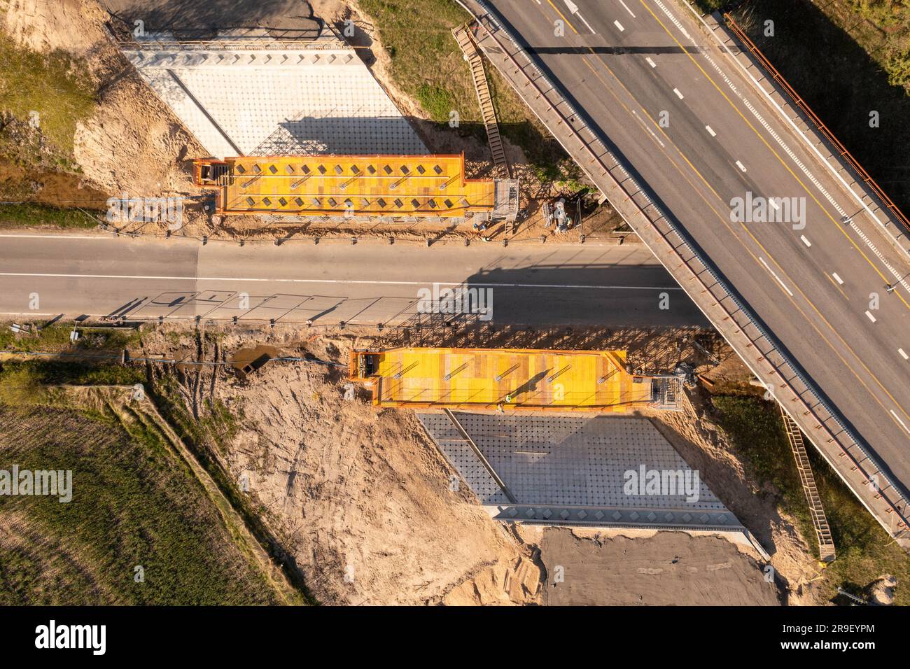 Drone photography of highway bridge being built during summer day. High ...