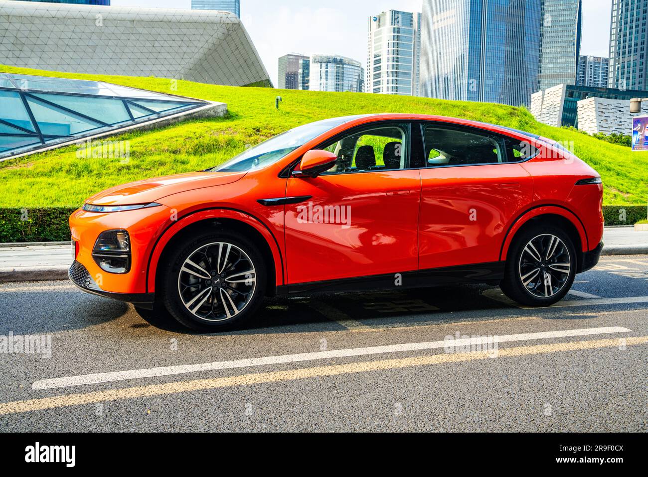 An XPeng G6 Performance SUV car outside the Guangzhou Opera House ...