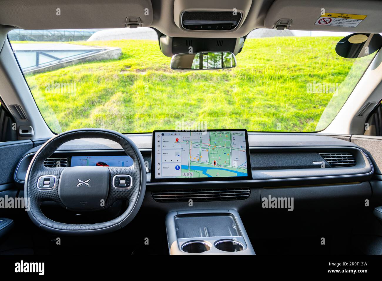 Front dashboard of an XPeng G6 Performance SUV electric car on a test ...