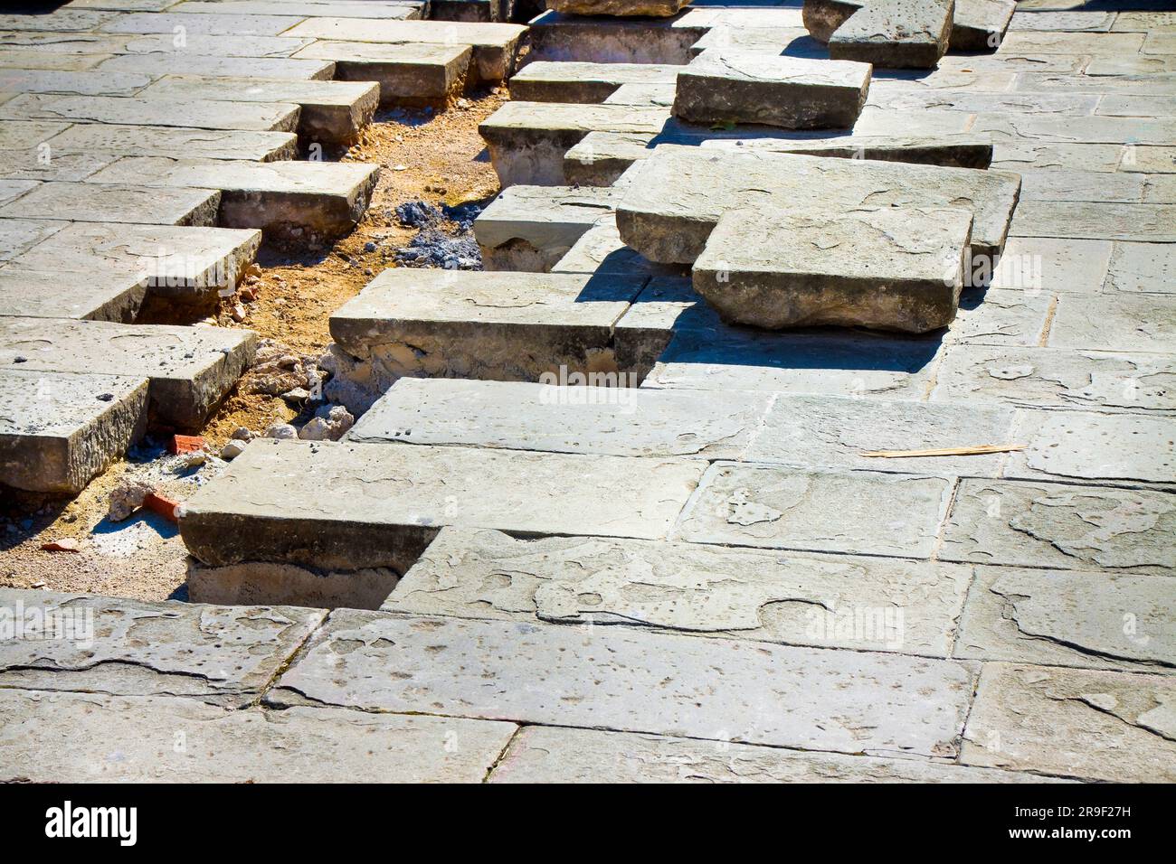 Typical Tuscany paving made with of carved stone blocks Stock Photo - Alamy