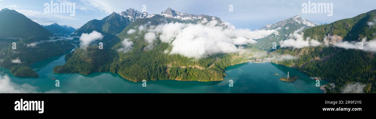 Clouds drift across the rugged landscape in North Cascades National ...