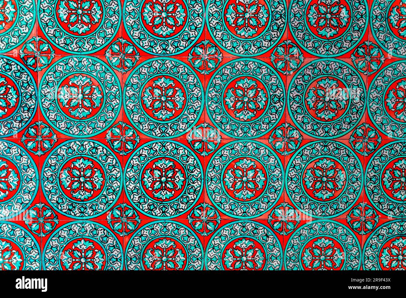 Fragment of Andalusian glazed ceramic tiled wall close up texture ...