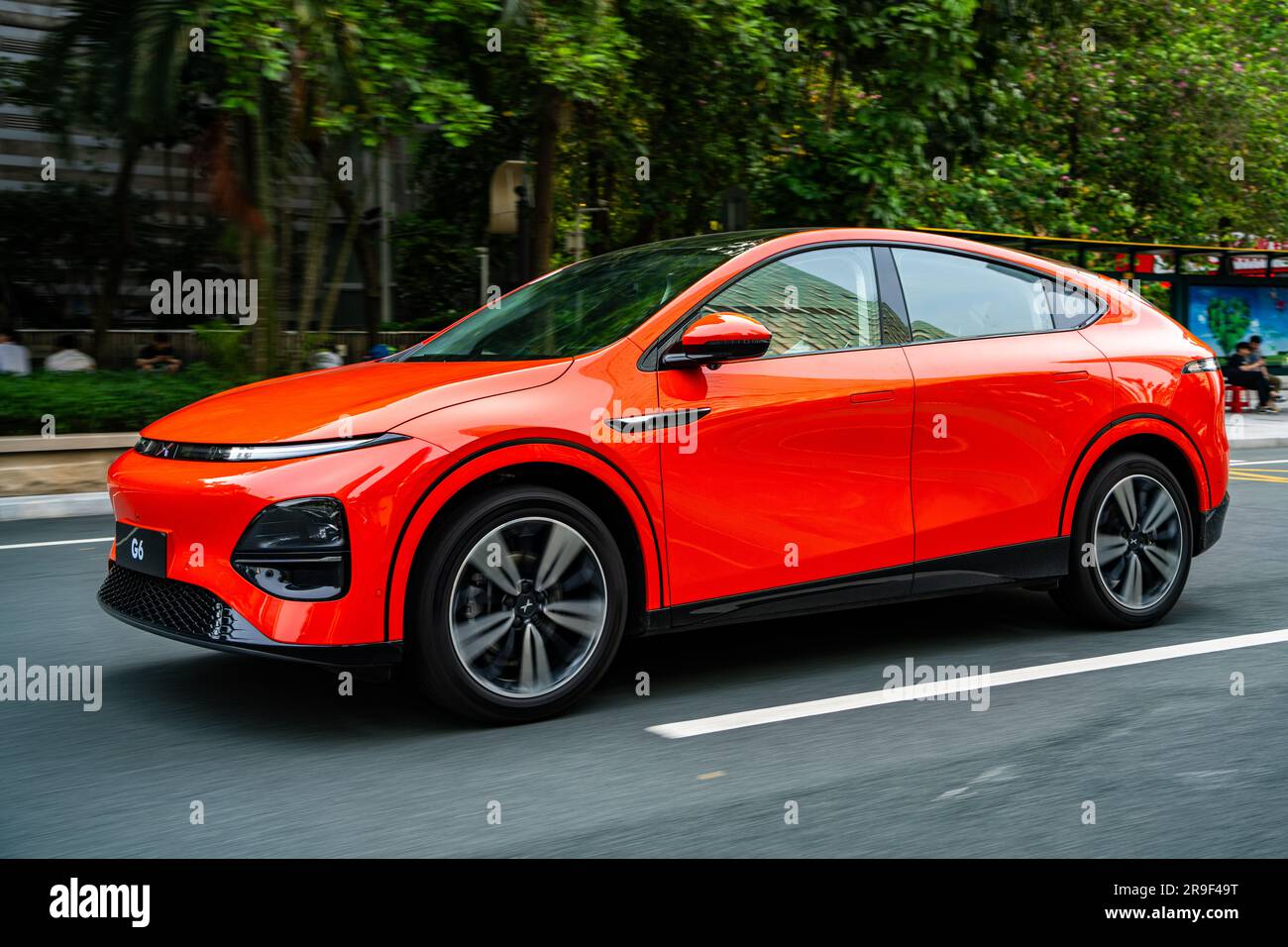 An XPeng G6 Performance electric SUV car being driven on a test drive ...