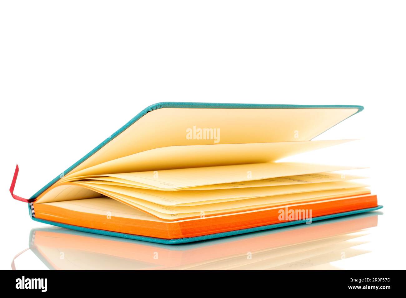 Closed notebook with pen on blue table hi-res stock photography and ...