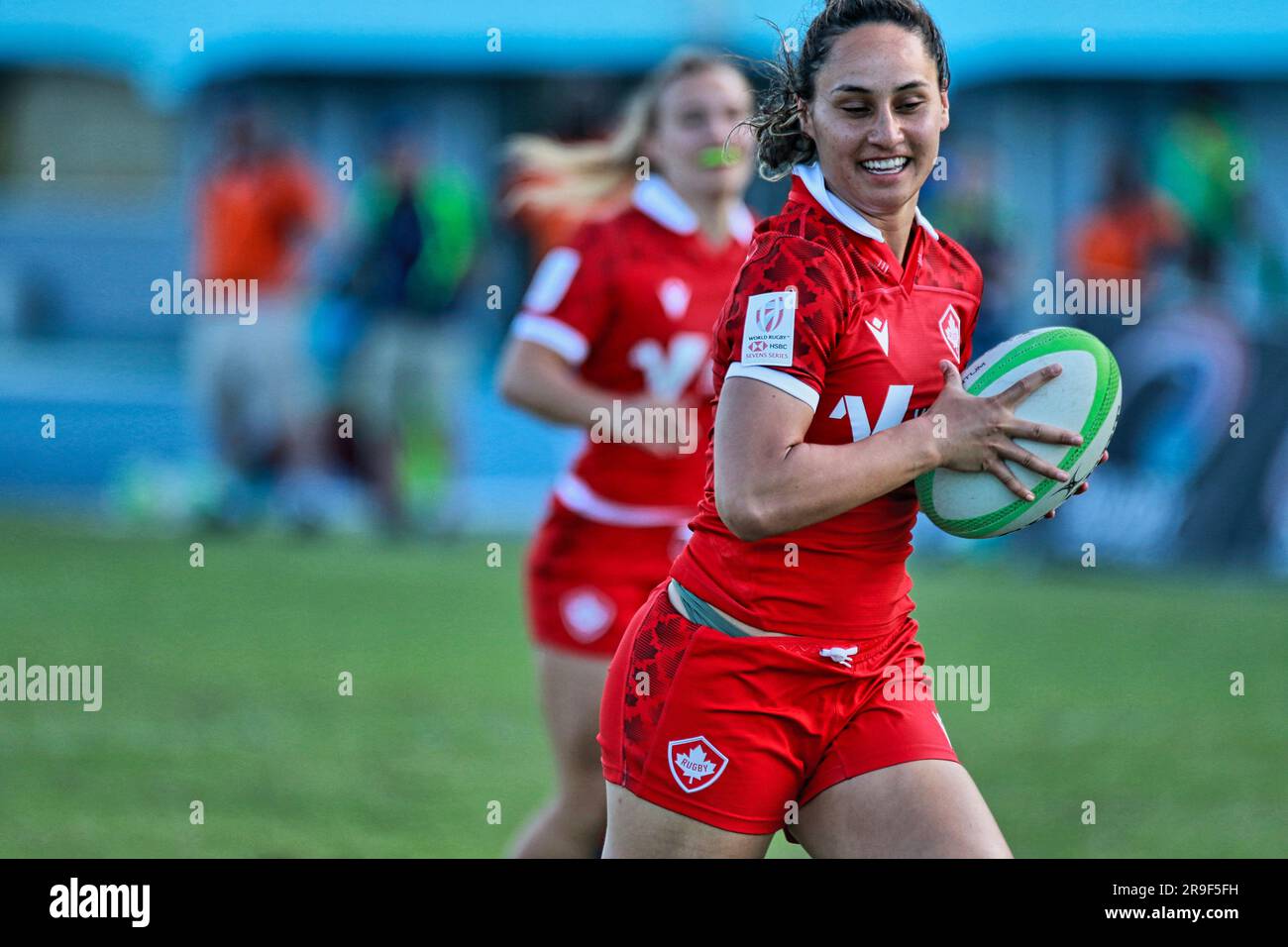 A group of female Canadian rugby players competing in the Rugby Sevens ...