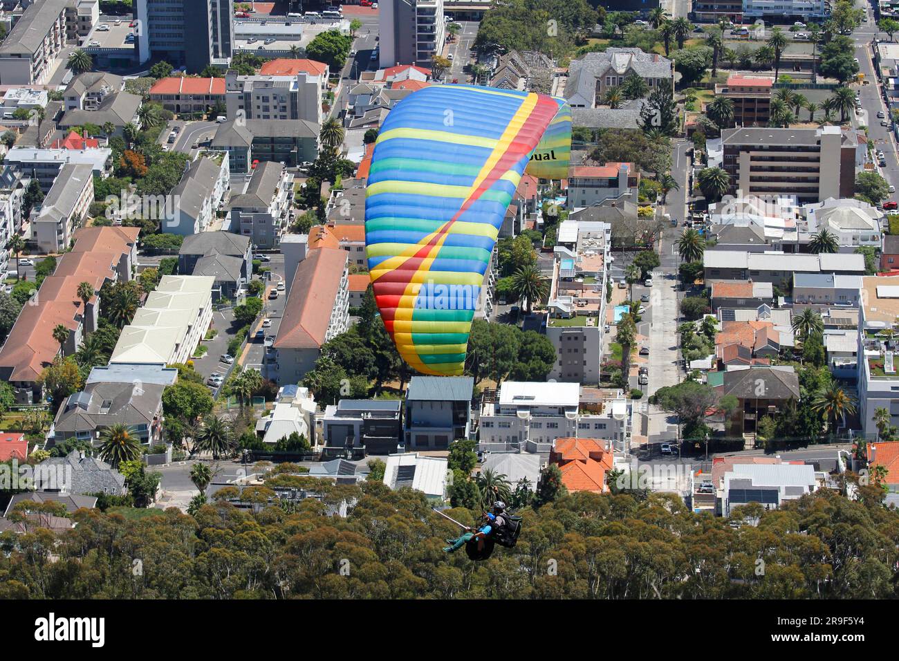 Paragliding in front of the front face of Table Mountain or with a city ...