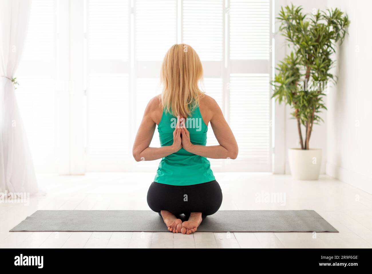 Reverse prayer pose hi-res stock photography and images - Alamy
