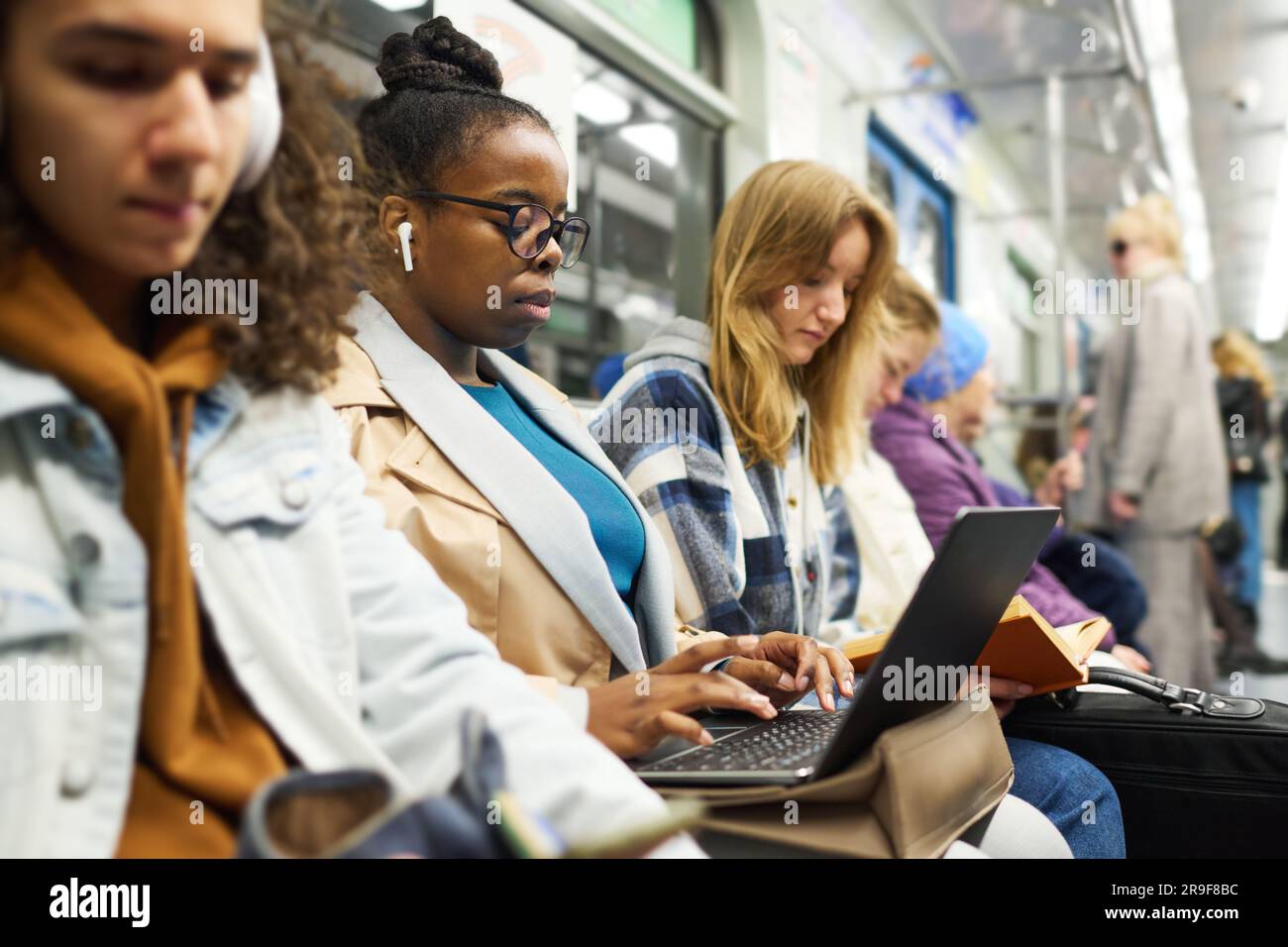 Passengers among young woman hi-res stock photography and images - Alamy