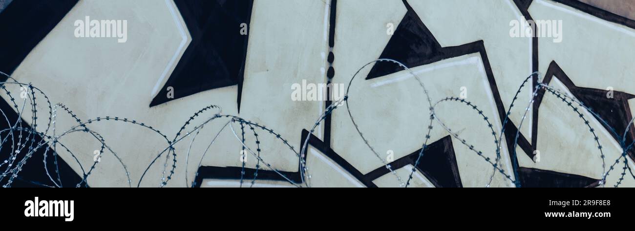 Abstract colorful fragment of graffiti paintings on brick wall behind ...