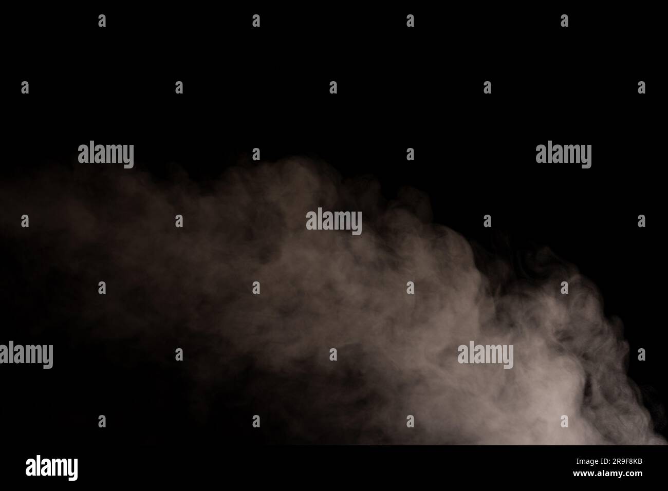White steam on a black background. Copy space Stock Photo - Alamy