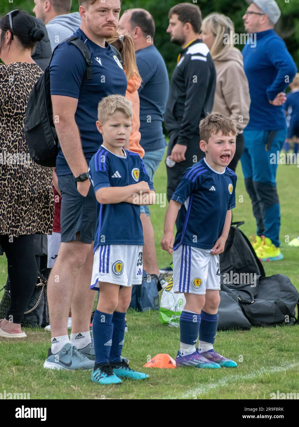 Glasgow, Scotland UK. June 25th, 2023: Kids playing a football ...