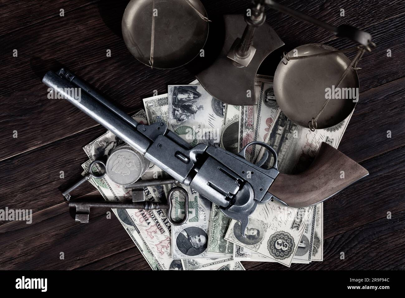 Old west Colt revolver and US banknotes and silver certificates with ...