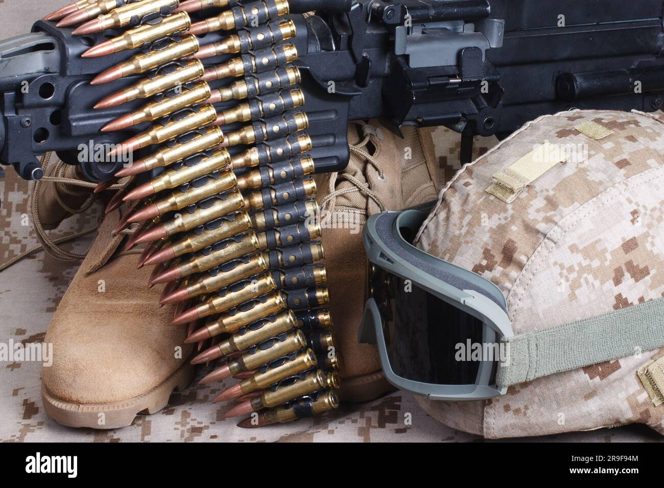 US MARINES. Machine gun with ammunition belt and armor helmet with ...