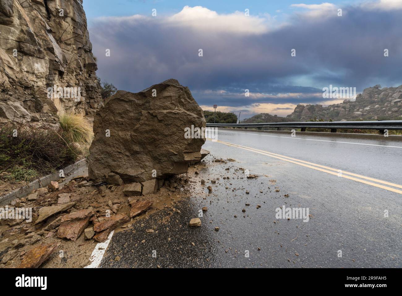 Rainy road rockslide blocking traffic lane on Santa Susana Pass Road in ...