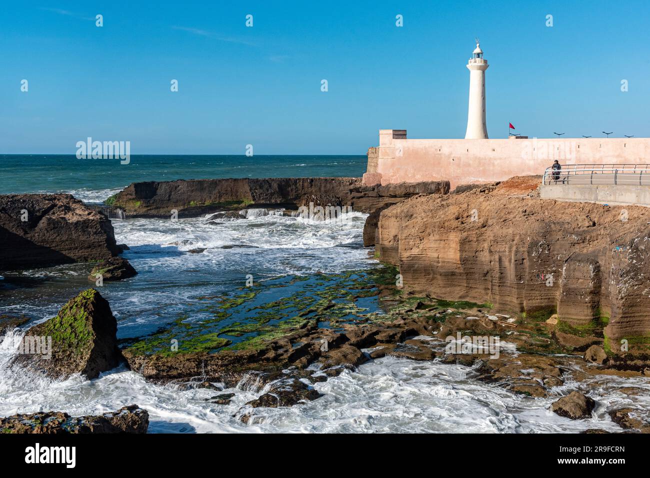 The lighthouse of Rabat during calm sea, Morocco Stock Photo - Alamy