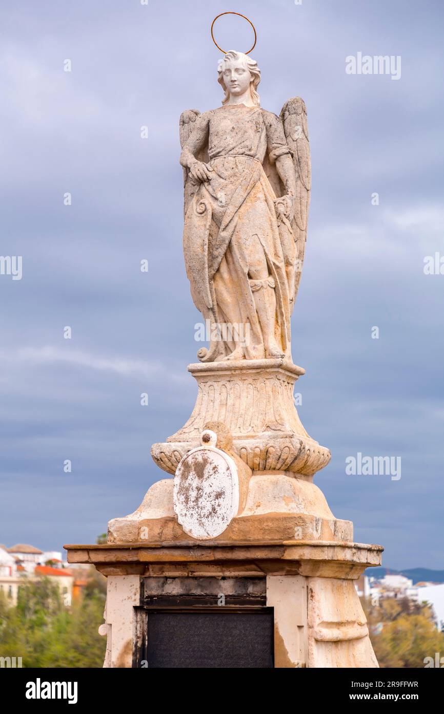 Statue of Saint Raphael in the middle of the Roman Bridge, Puente ...