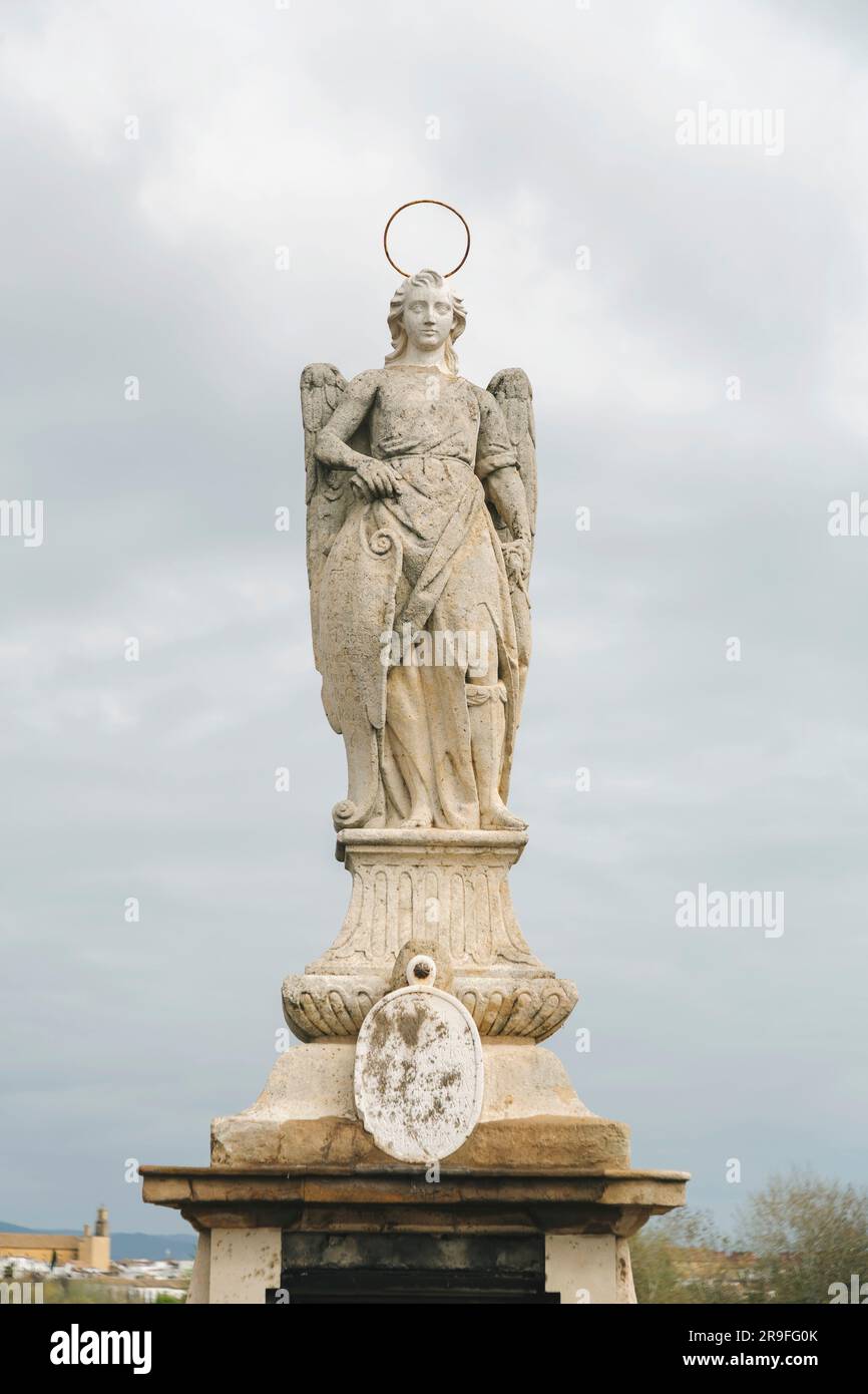 Statue of Saint Raphael in the middle of the Roman Bridge, Puente ...