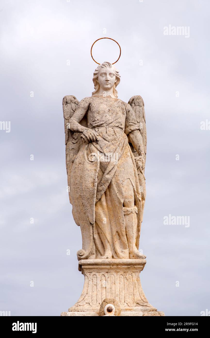 Statue of Saint Raphael in the middle of the Roman Bridge, Puente ...