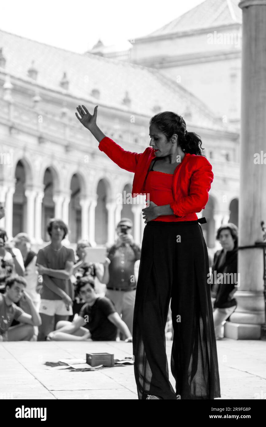 Seville, Spain - Feb 24, 2022: Street artist performing flameco art ...